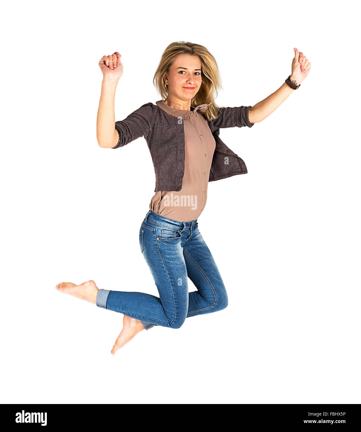 Young woman jumping isolated on white background Stock Photo - Alamy