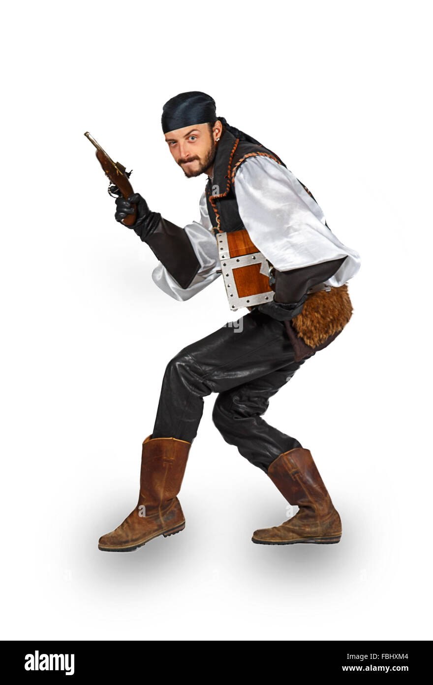 Man dressed as a pirate with a gun and chest isolated on white ...