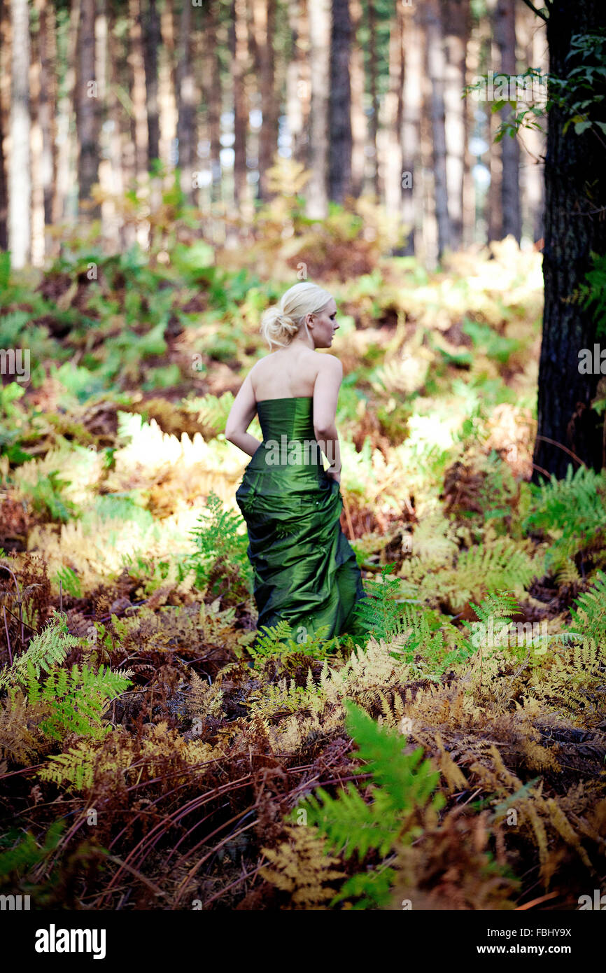 young woman with dress in forest Stock Photo - Alamy
