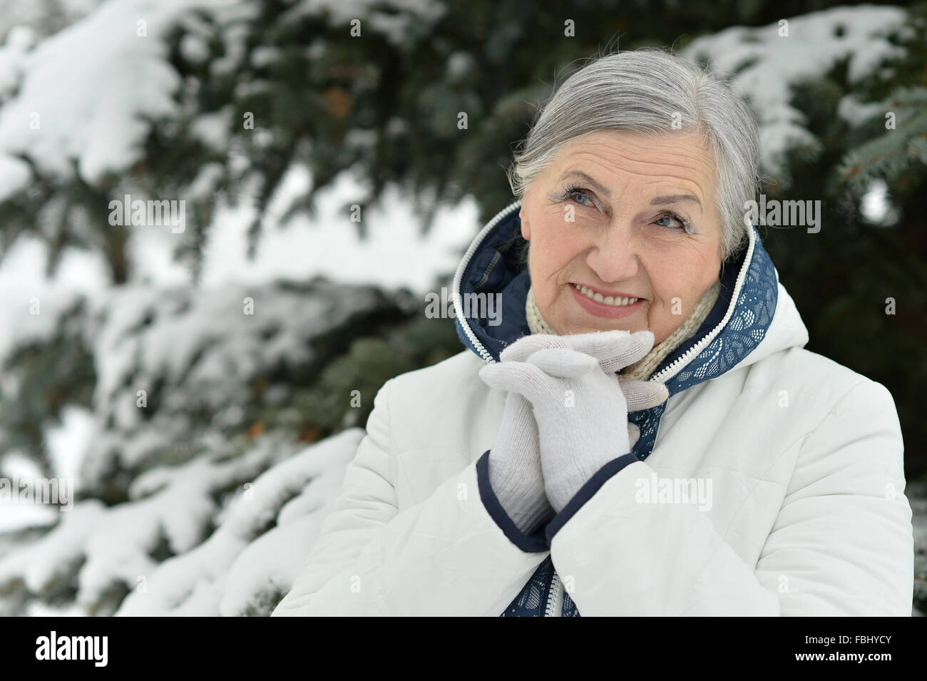 Old woman in the winter Stock Photo - Alamy