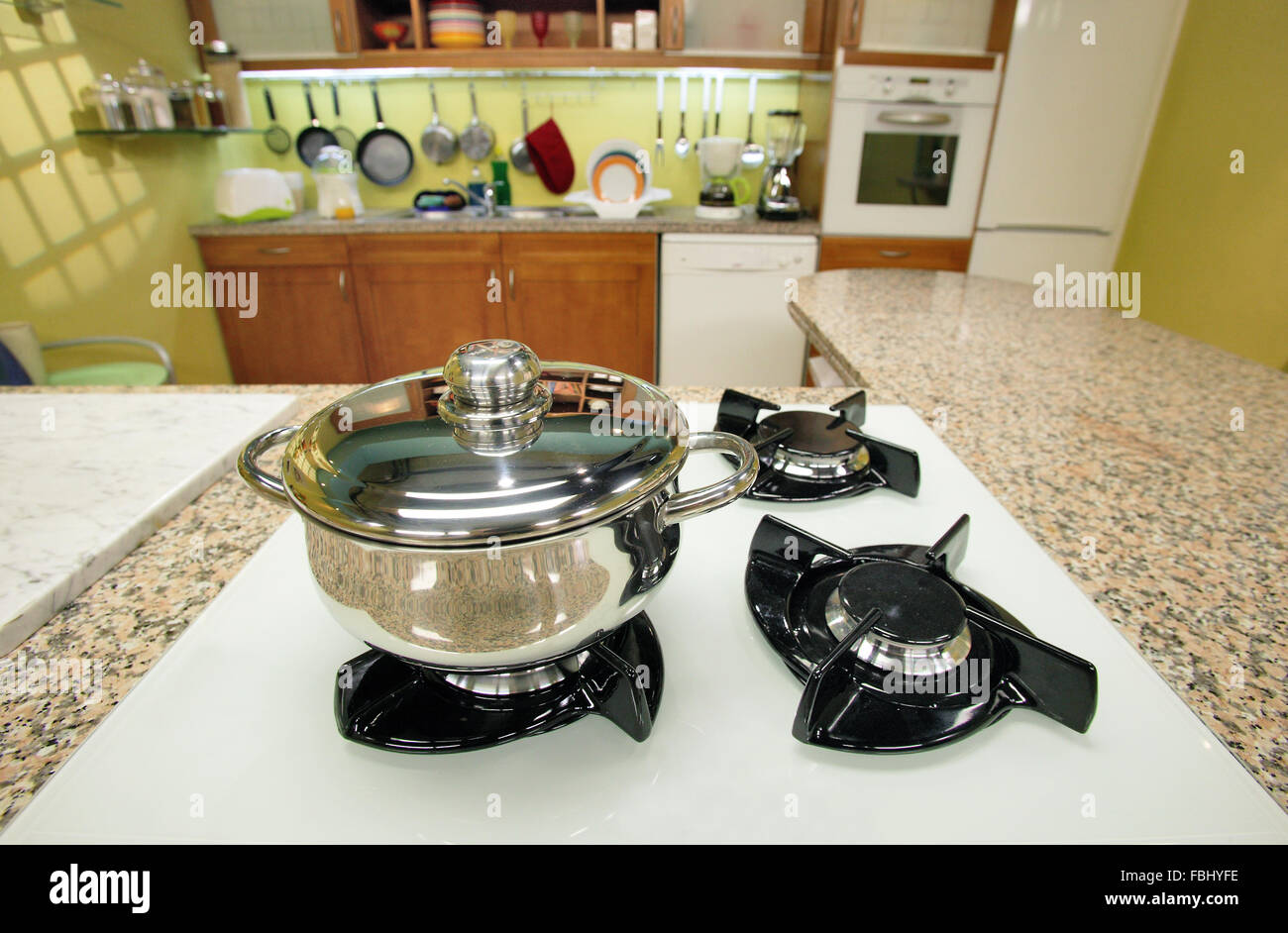 Preparing Dinner and Cooking on a stove Stock Photo - Alamy