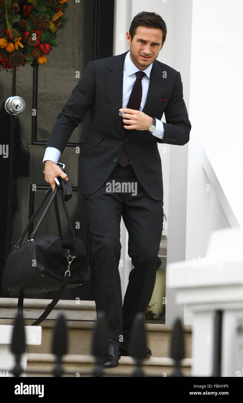 Frank Lampard leaving home, wearing a smart suit and tie. Featuring ...