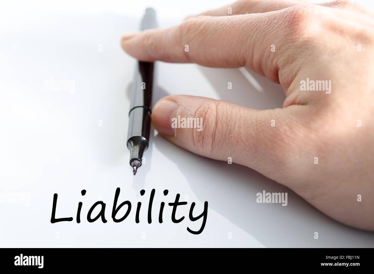 Liability text concept isolated over white background Stock Photo - Alamy