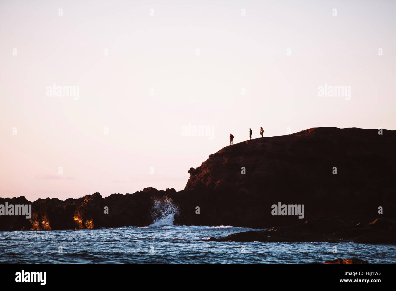 People on mountain crest Stock Photo - Alamy