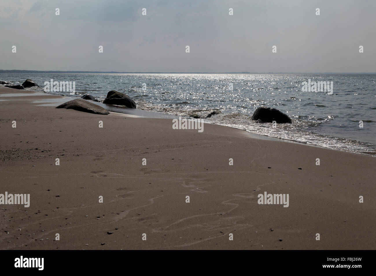Beach and steep coast at the Baltic Sea in the Wolin National Park ...