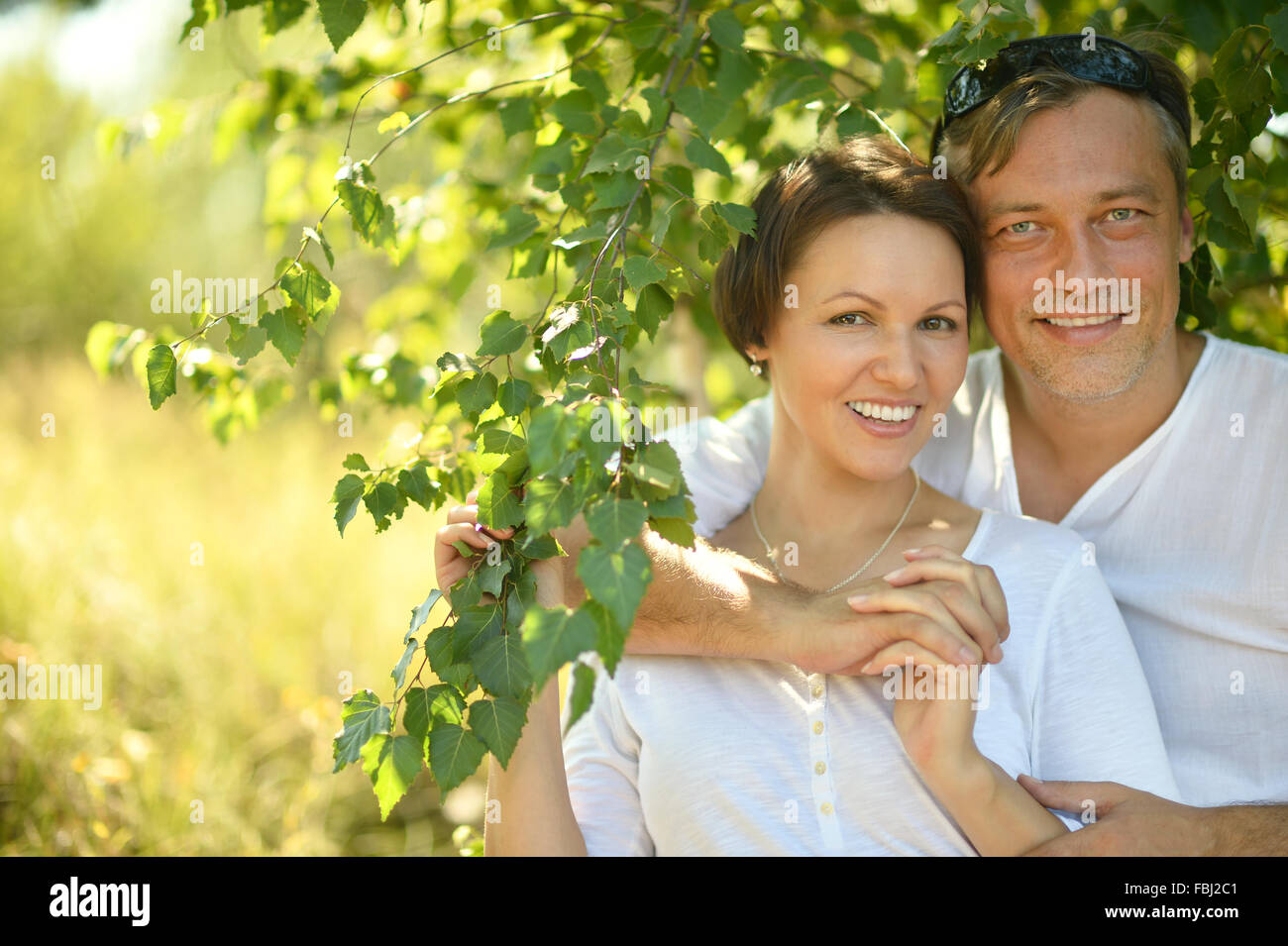 couple in summer park Stock Photo - Alamy