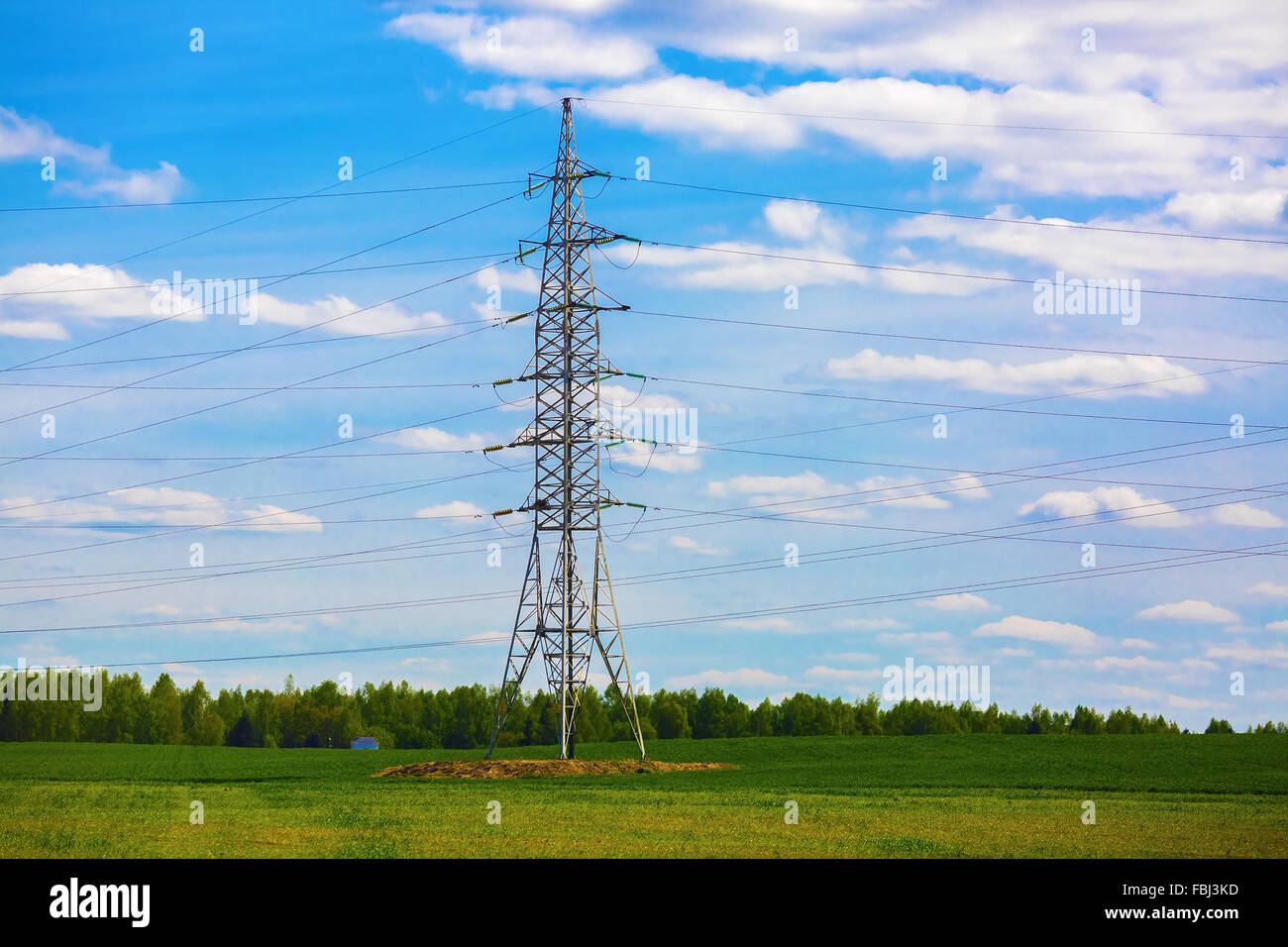 Electricity transmission pylon. High voltage pylon against blue sky ...
