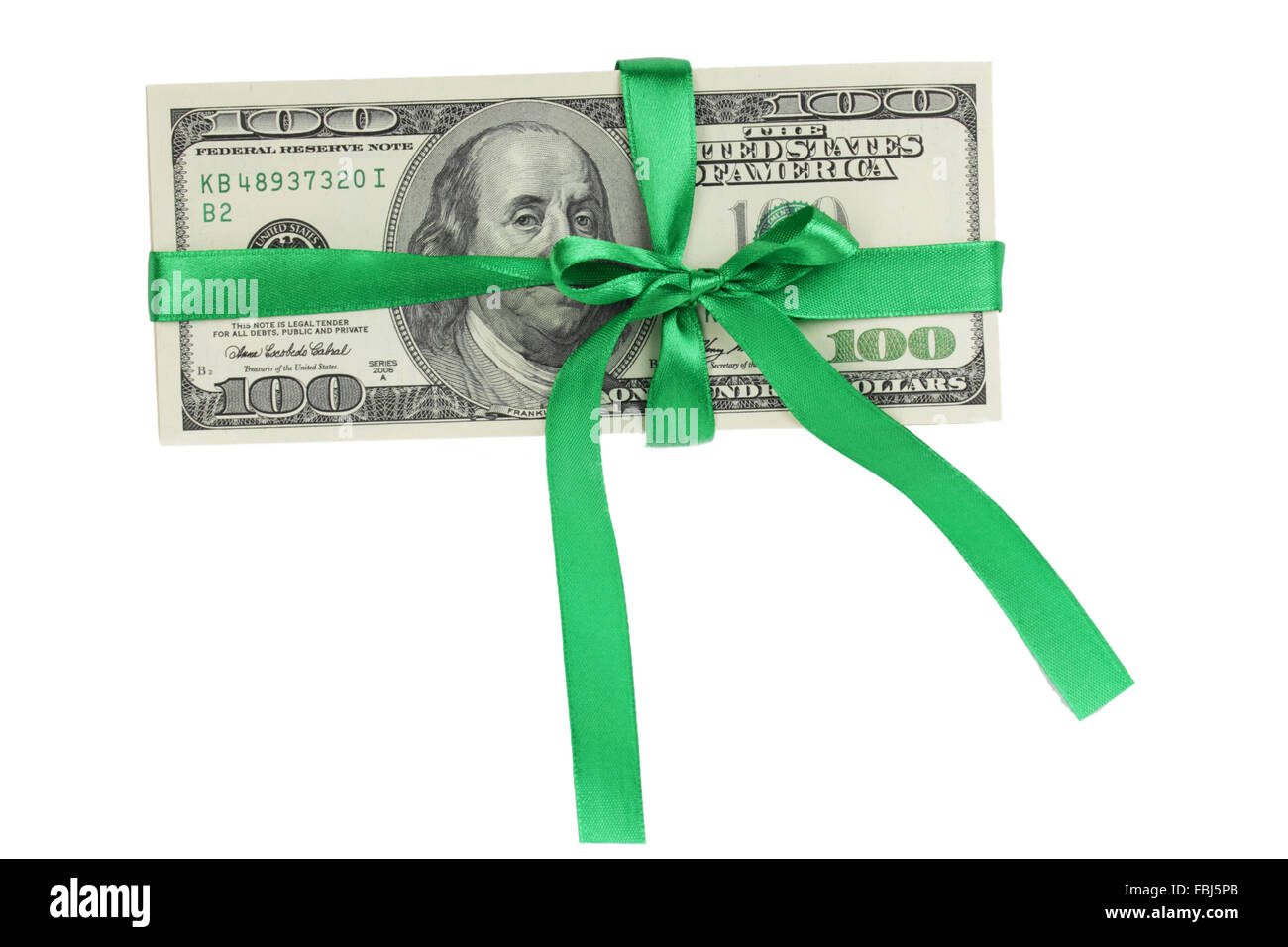 Dollars in a green ribbon Stock Photo - Alamy