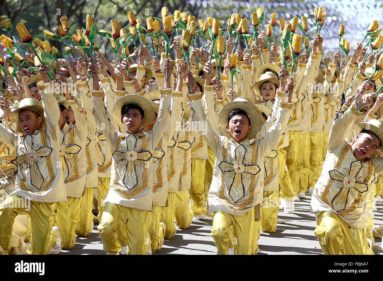 Cebu, Philippines. 17th Jan, 2016. Dancers wearing colorful costumes participate in street ...