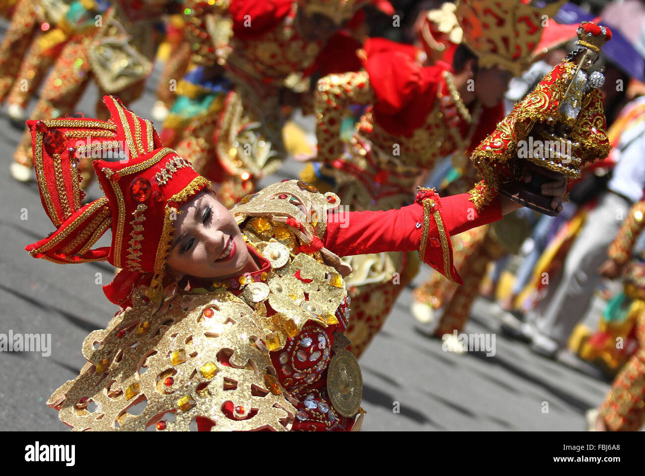 Cebu, Philippines. 17th Jan, 2016. A dancer wearing colorful costume participates in street ...