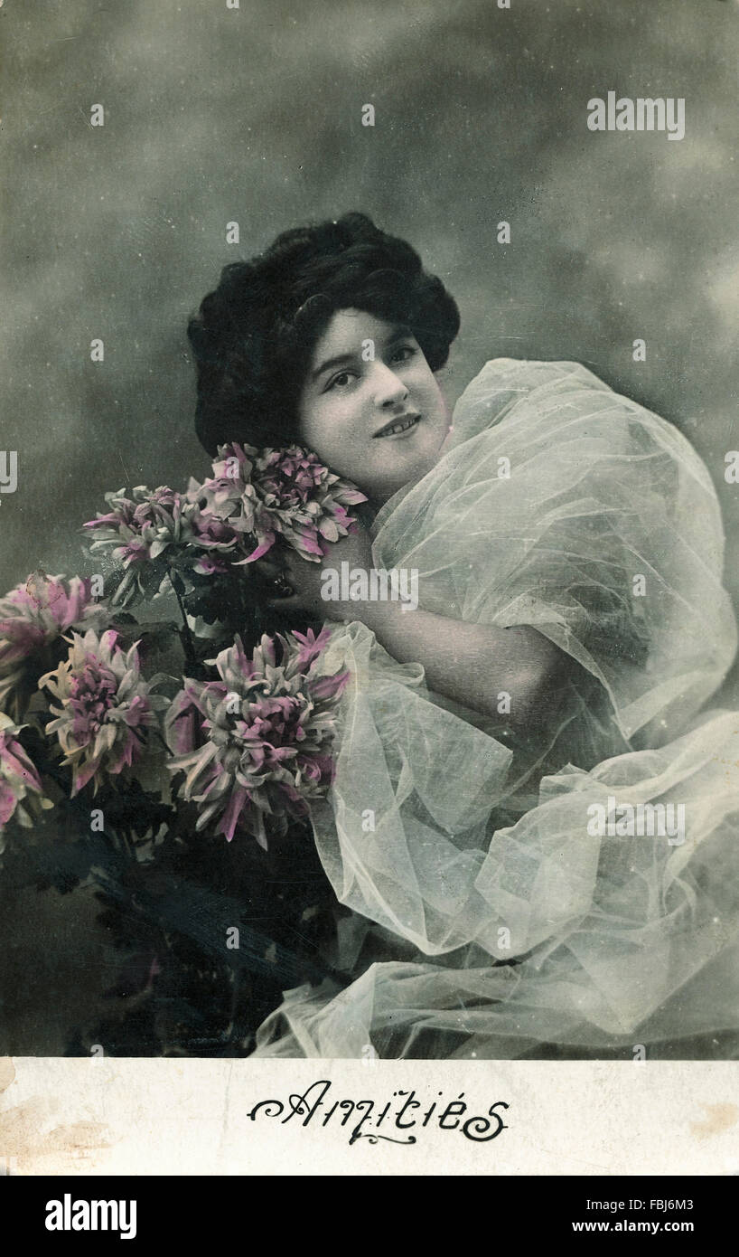 Postcard historical woman flowers hi-res stock photography and images ...