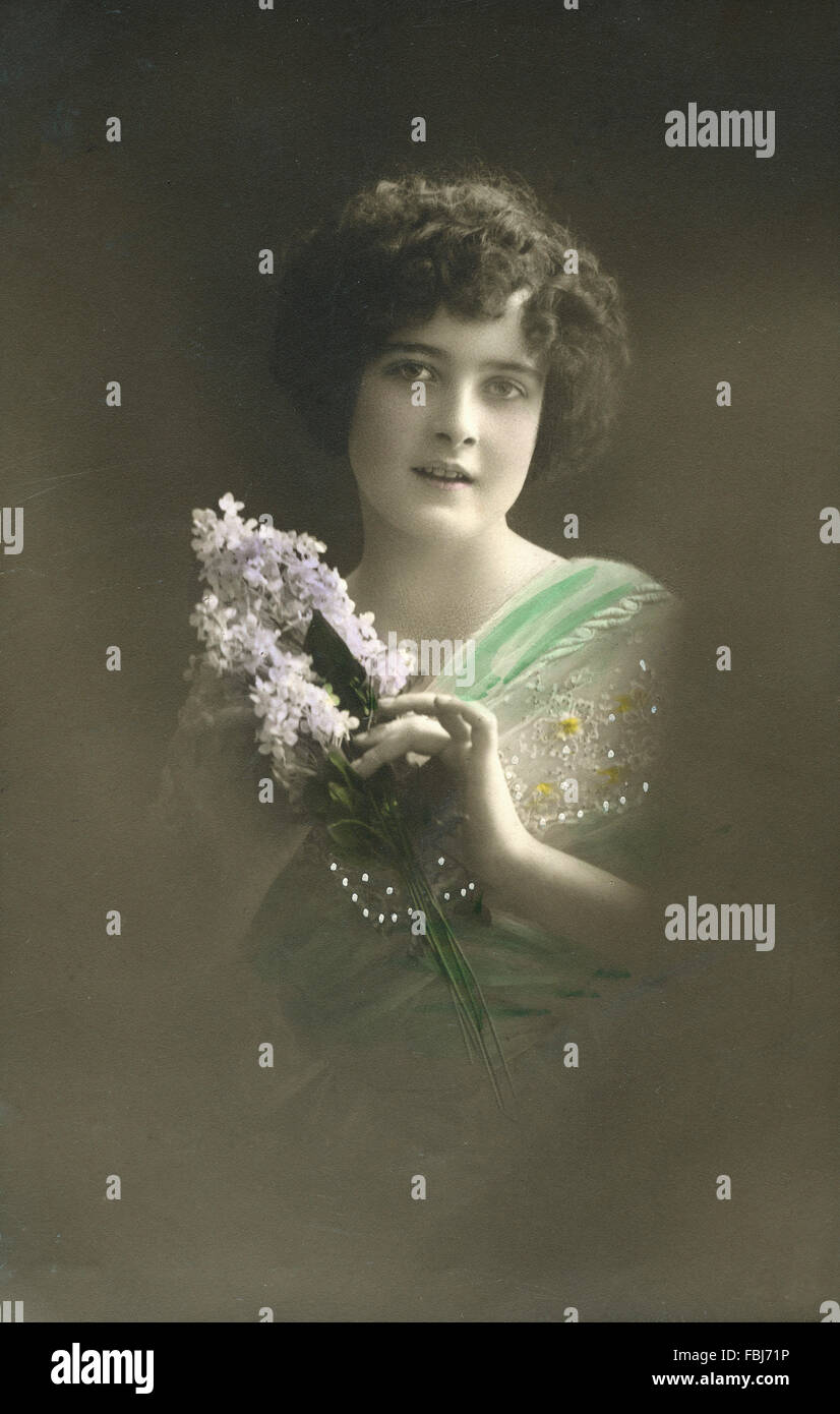 Postcard, historical, woman, flowers, lilac, portrait Stock Photo - Alamy