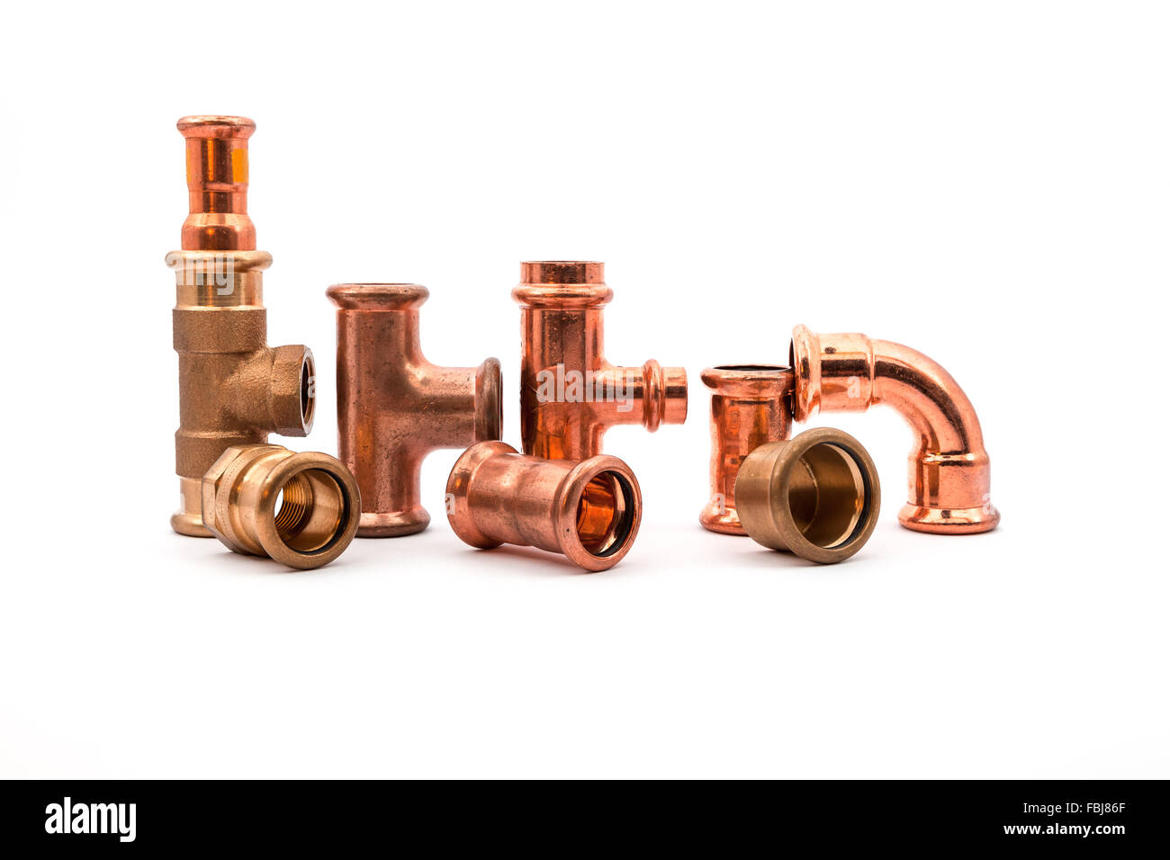 mapress copper various pieces on an white background Stock Photo - Alamy