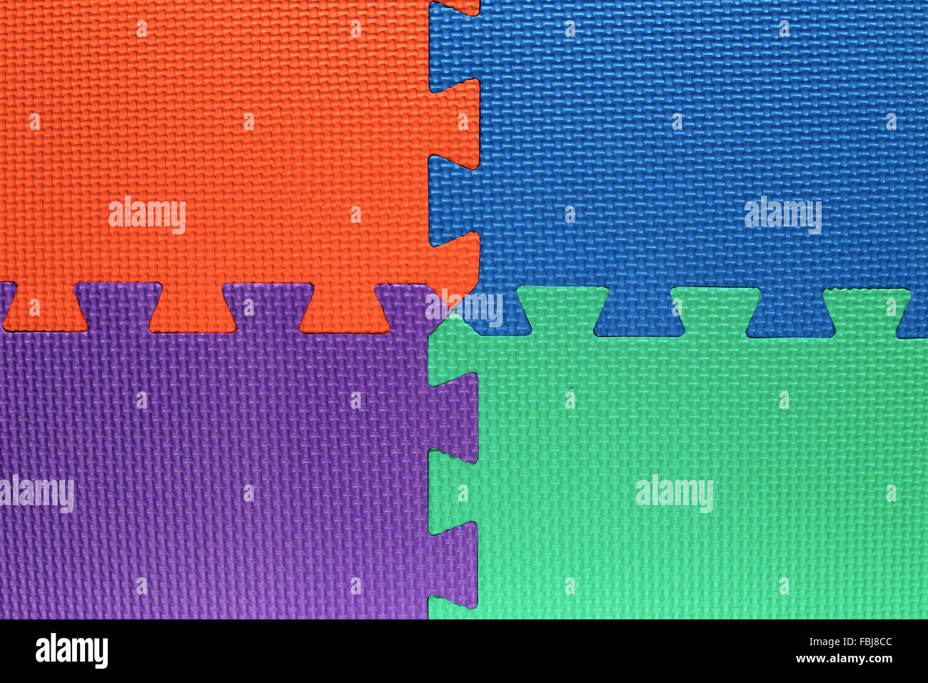 Four jigsaw puzzle pieces blue hi-res stock photography and images - Alamy