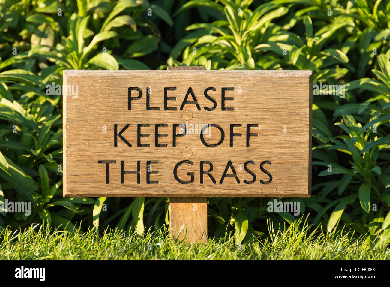 Please keep off the grass sign Stock Photo - Alamy