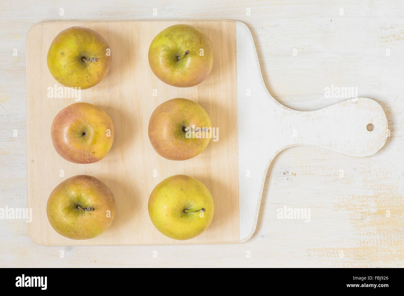 Six apples on a table one other top view Stock Photo - Alamy