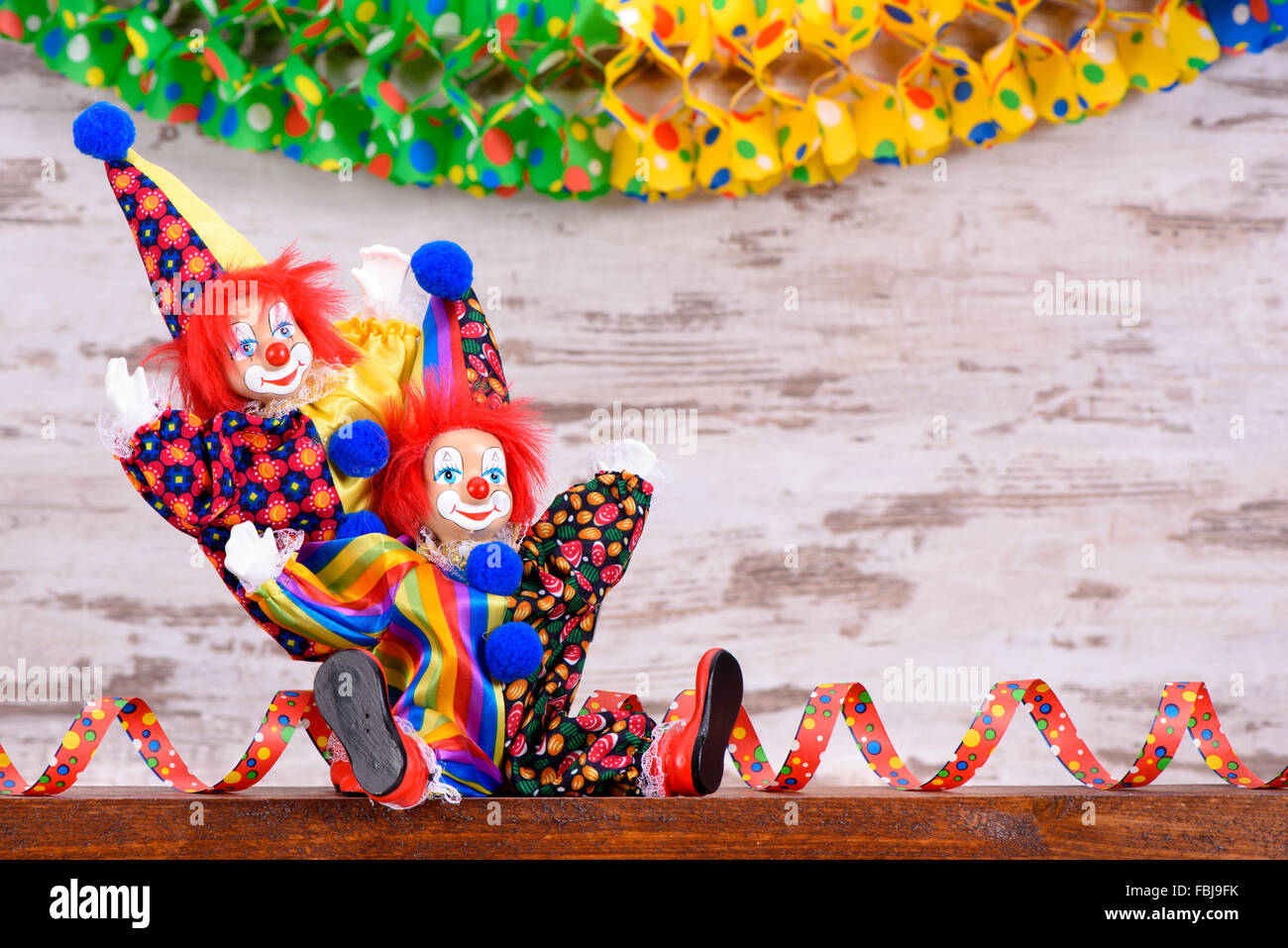 clown with paper streamer at carnival party Stock Photo - Alamy