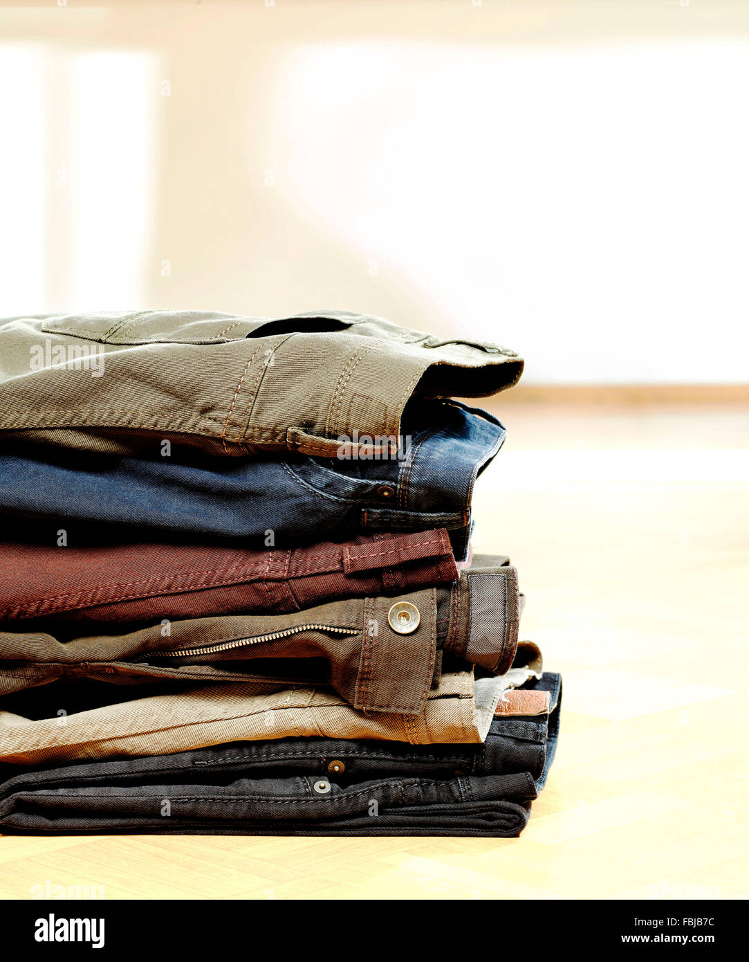 Stack of jeans Stock Photo - Alamy