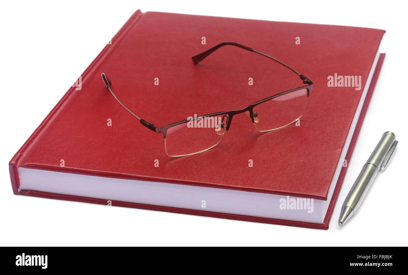 Maroon colored thesis paper with spectacles over white background Stock ...