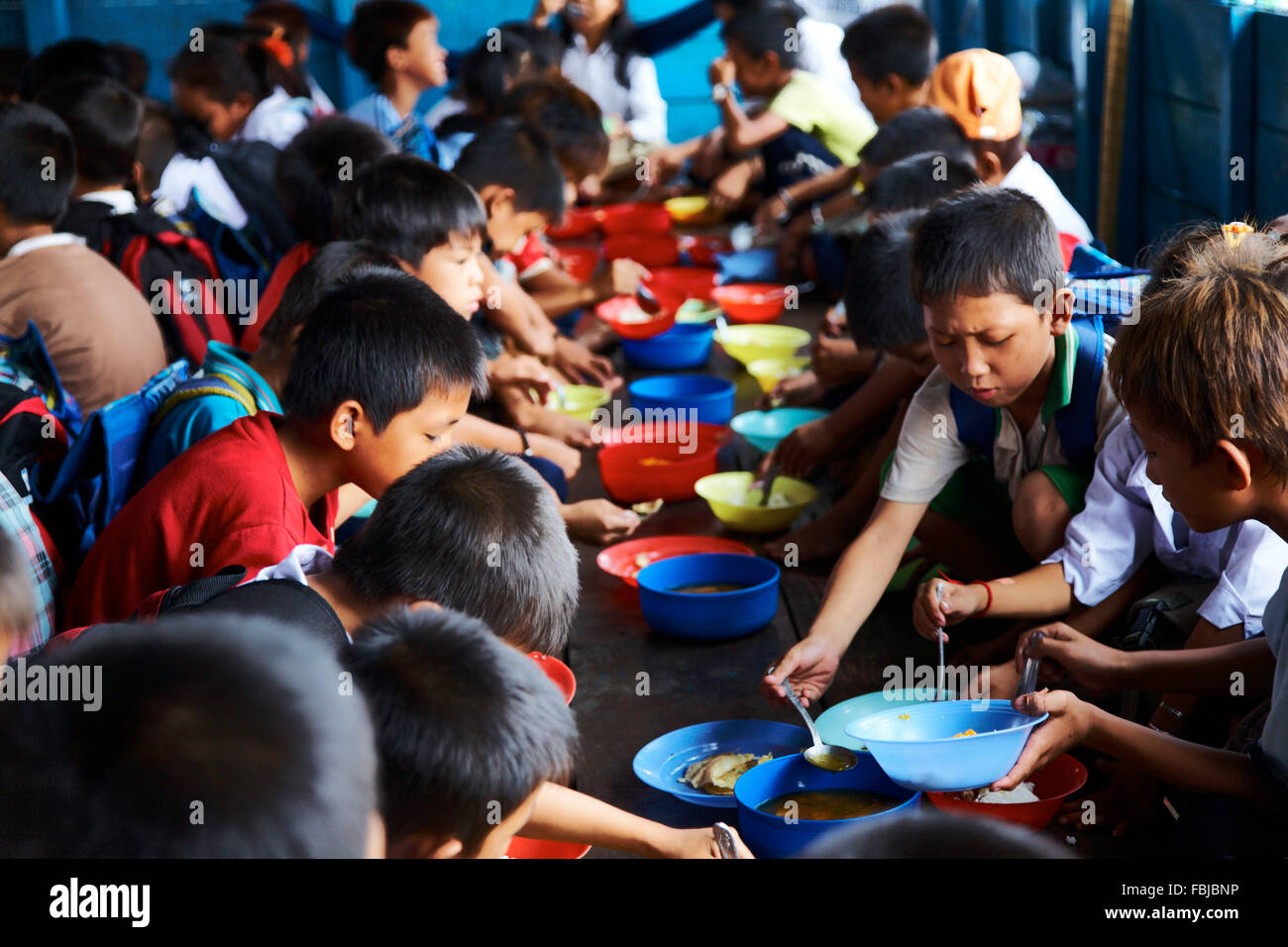 Children eating in school, Cambodia, orphanage Stock Photo - Alamy