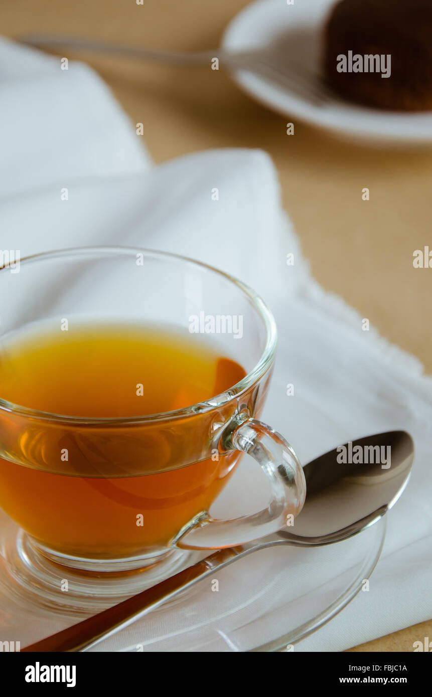 Glass Cup of Tea and Chocolate Cake for Tea Break Stock Photo - Alamy