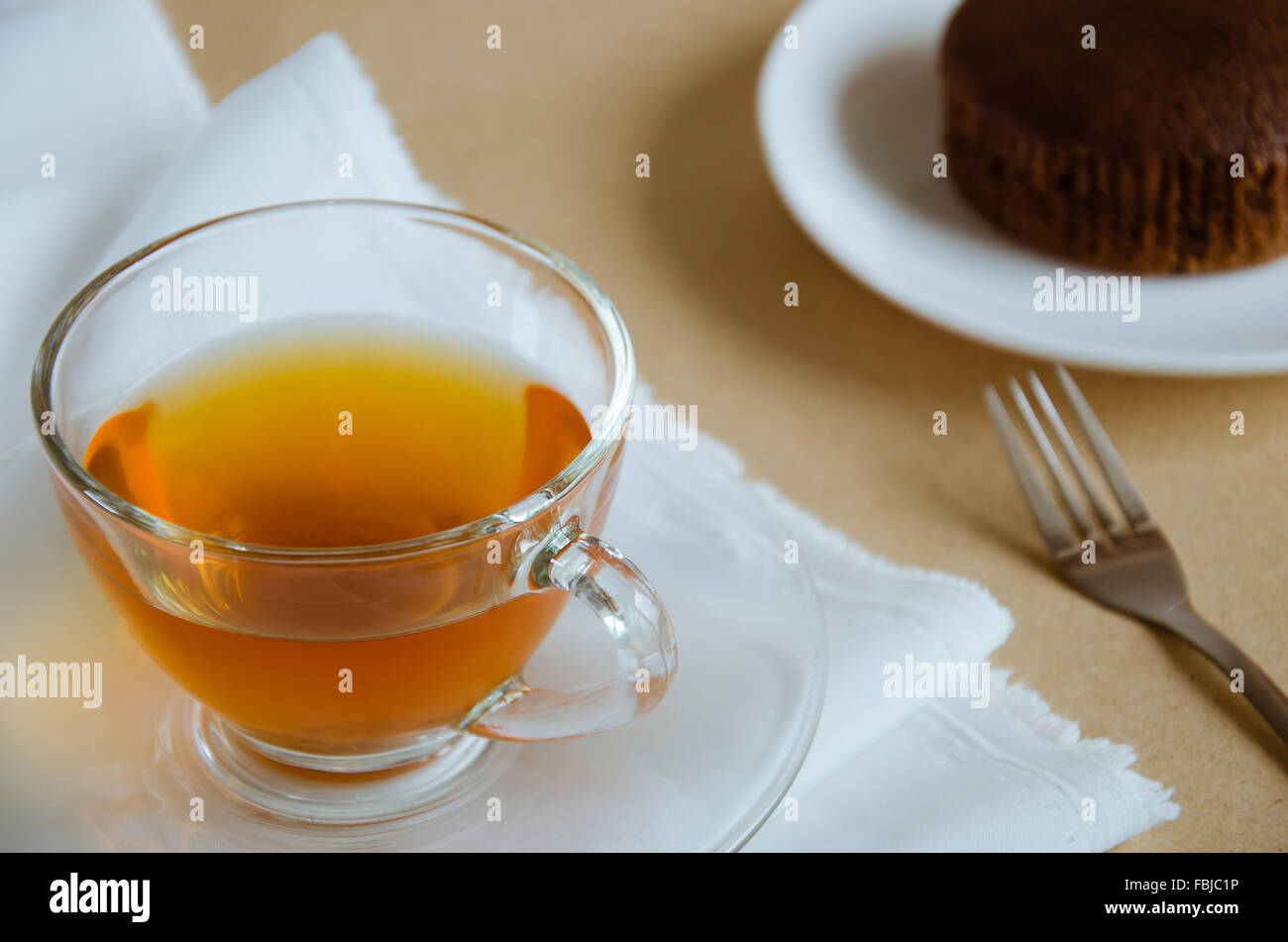 Glass Cup of Tea and Chocolate Cake for Tea Break Stock Photo - Alamy