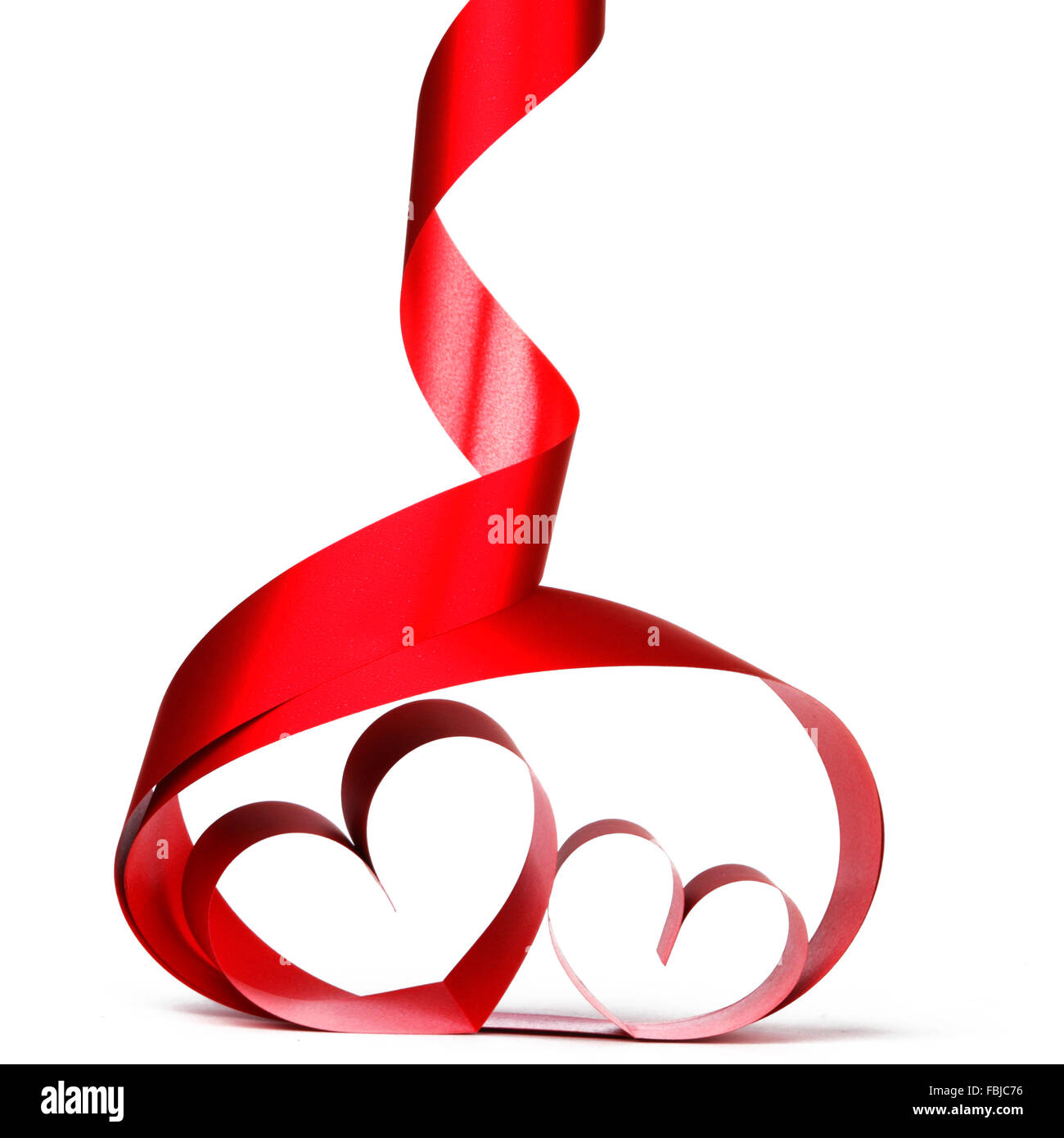 Red heart ribbon bow isolated on white background Stock Photo - Alamy