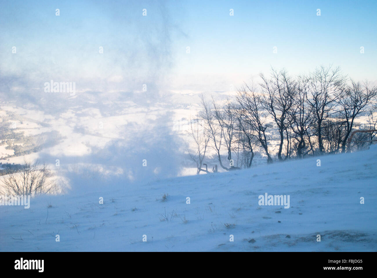 Snow wind in mountains Stock Photo - Alamy
