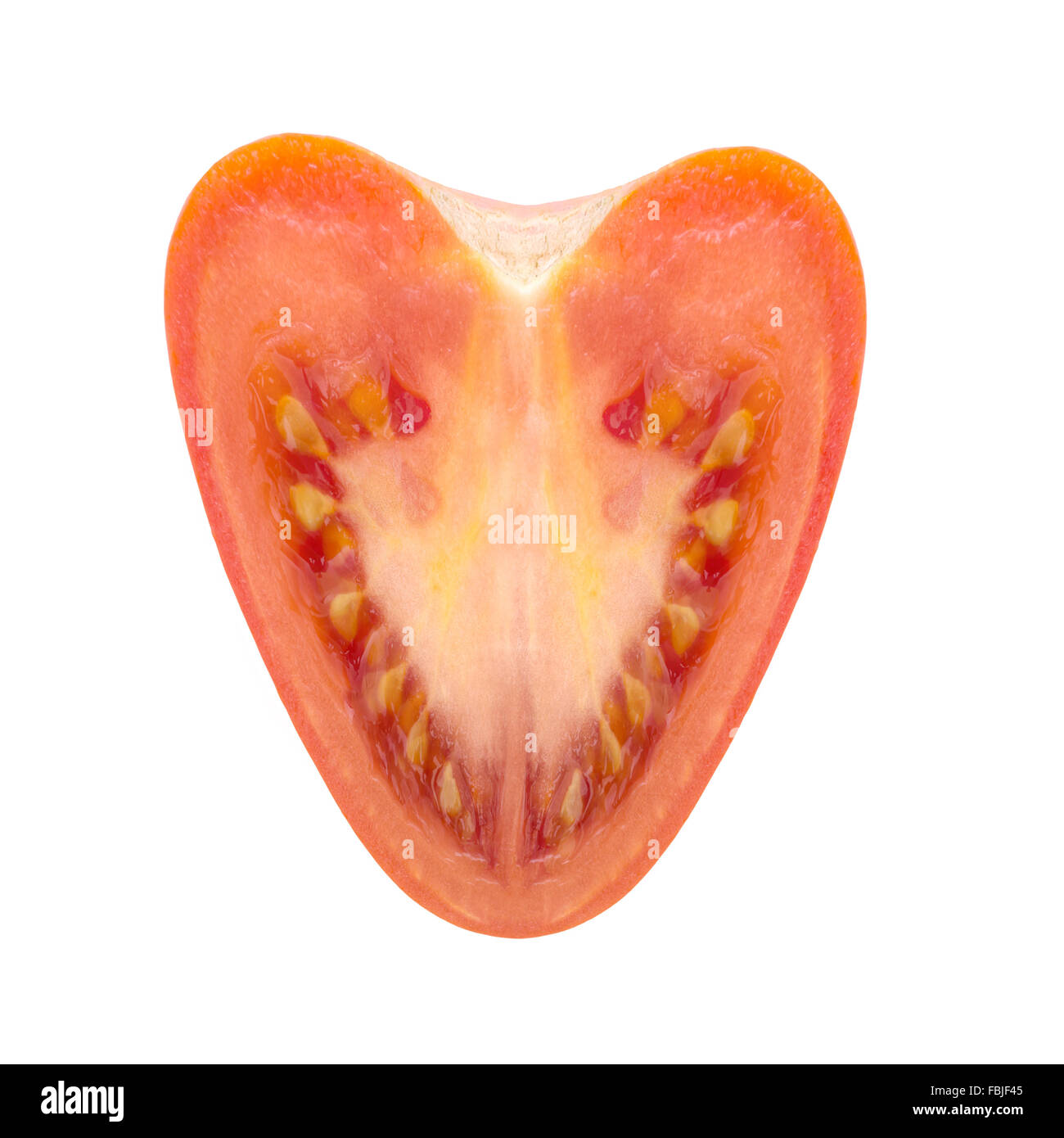 Heart shaped tomato isolated on white Stock Photo - Alamy