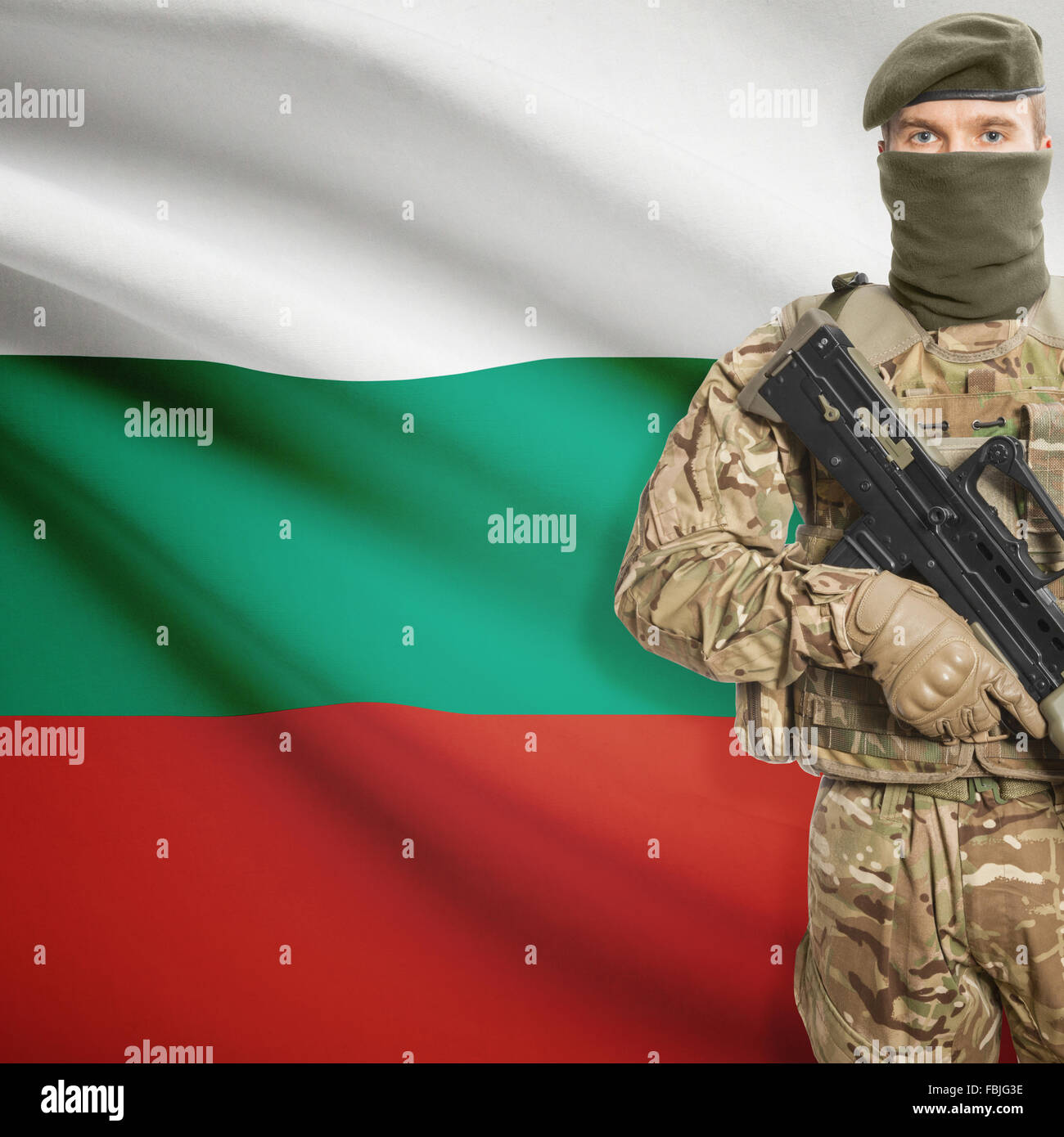 Soldier with machine gun and national flag on background series ...
