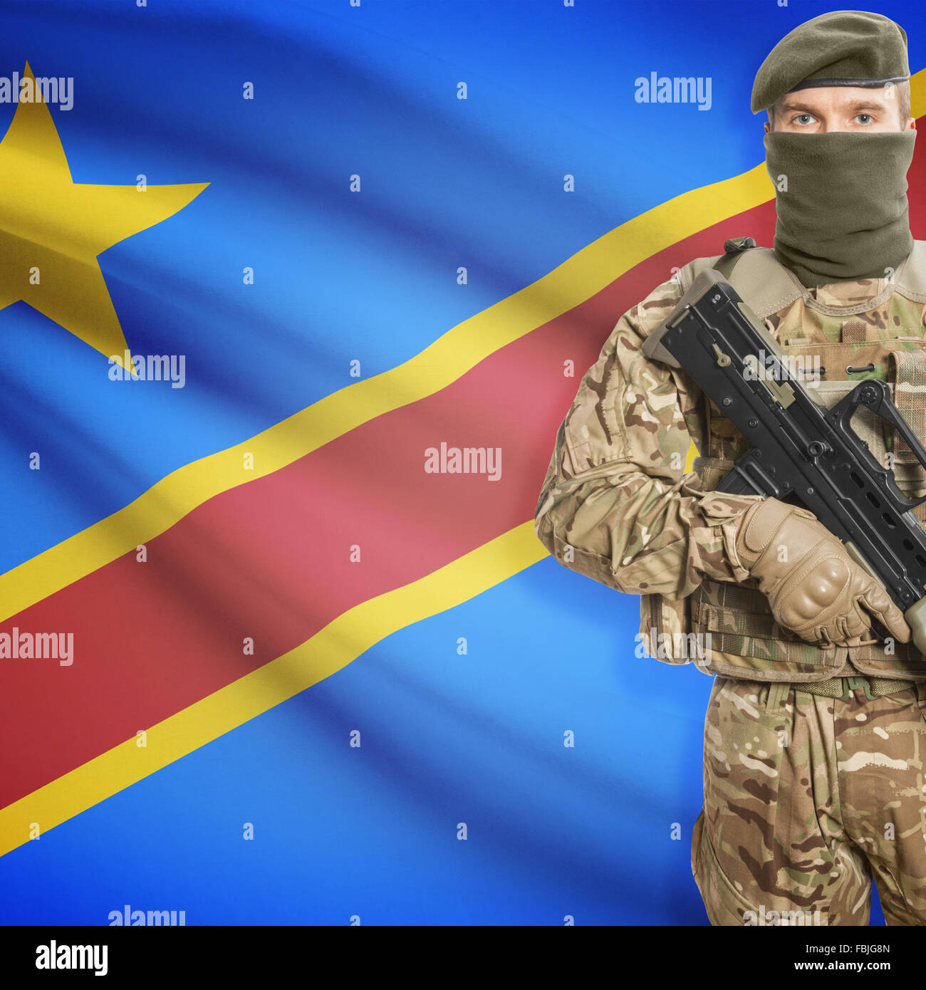 Soldier with machine gun and national flag on background series - Congo ...
