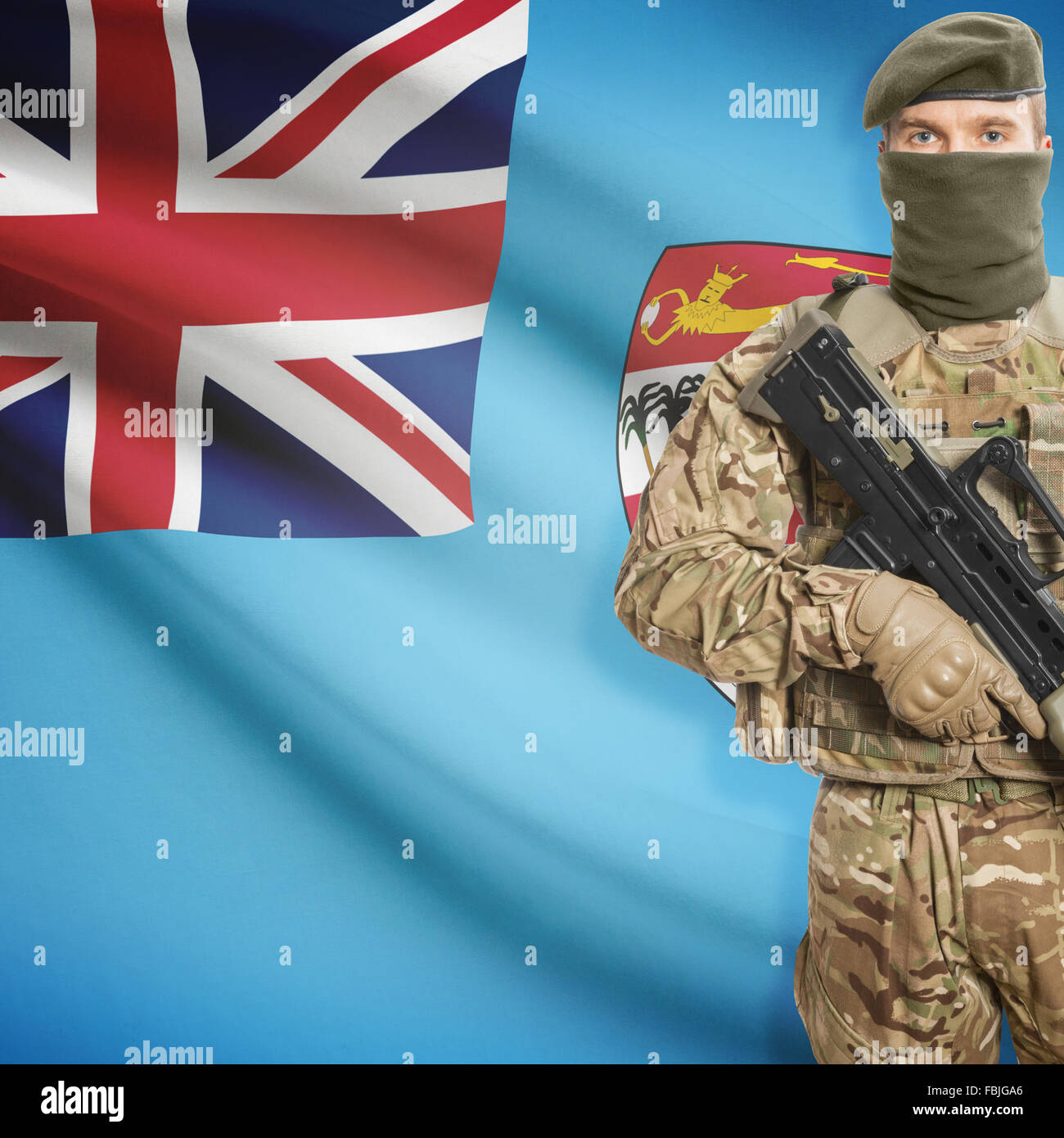 Soldier with machine gun and national flag on background series - Fiji ...