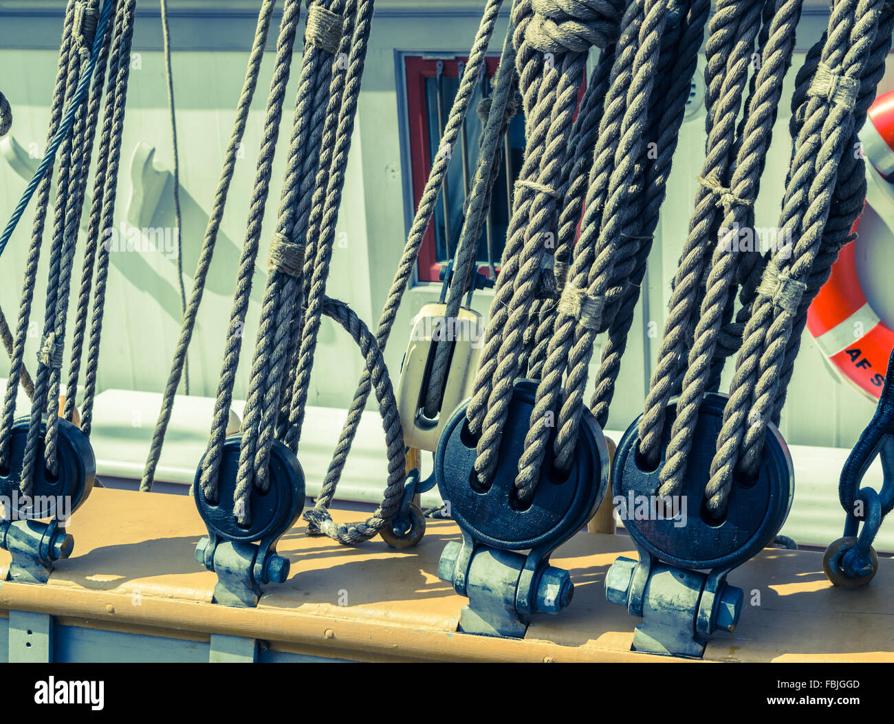 Blocks and tackles of a sailing vessel Stock Photo - Alamy