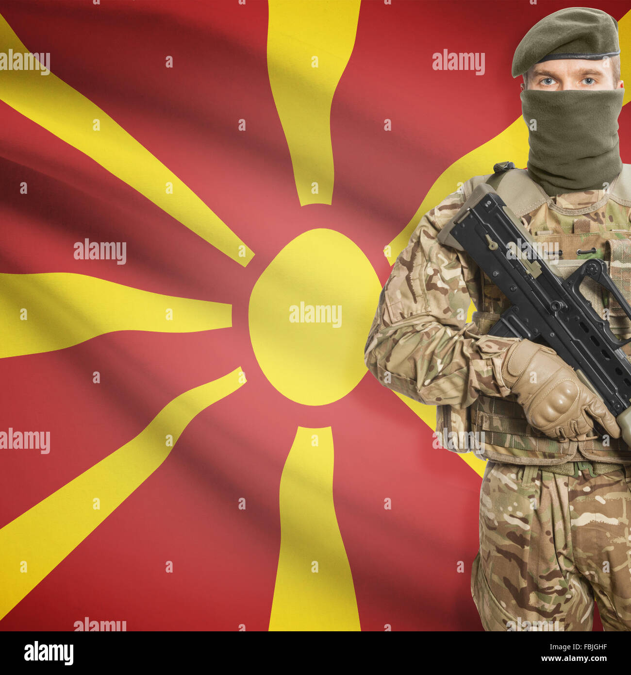 Soldier with machine gun and national flag on background series ...