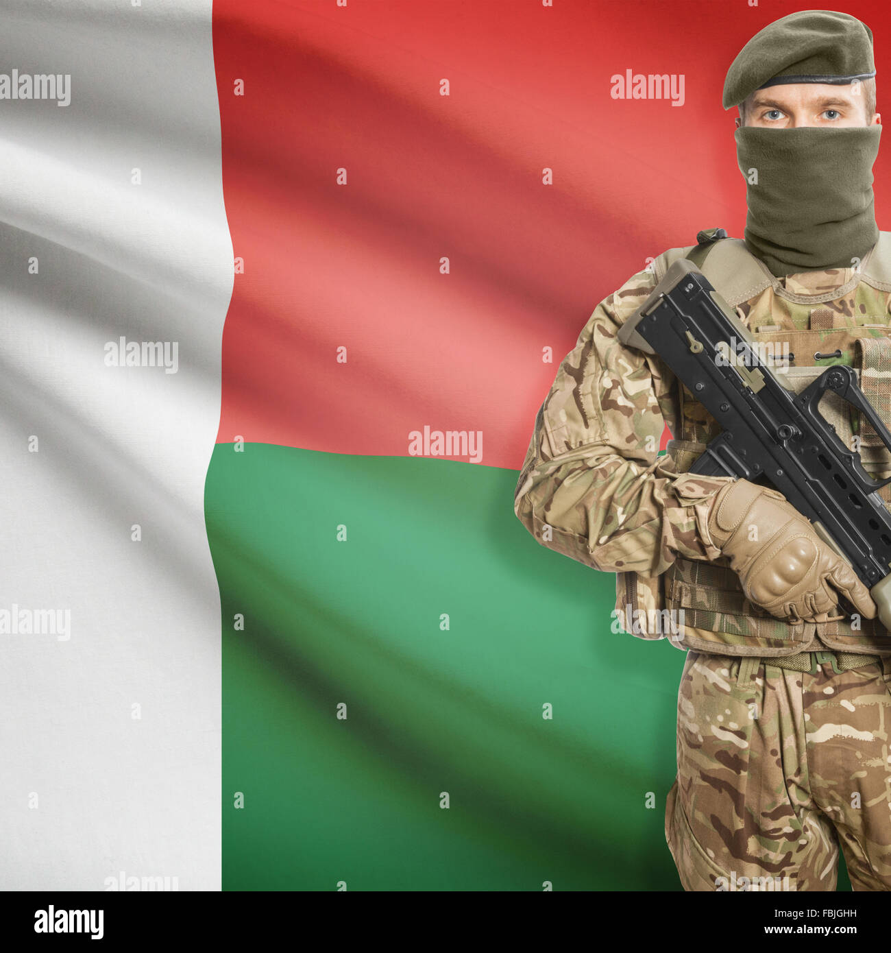 Soldier with machine gun and national flag on background series ...