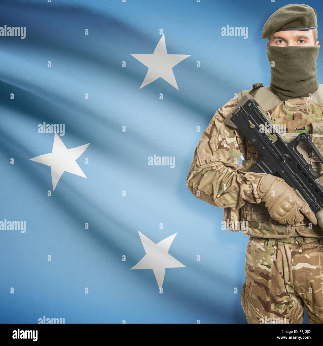 Soldier with machine gun and national flag on background series ...