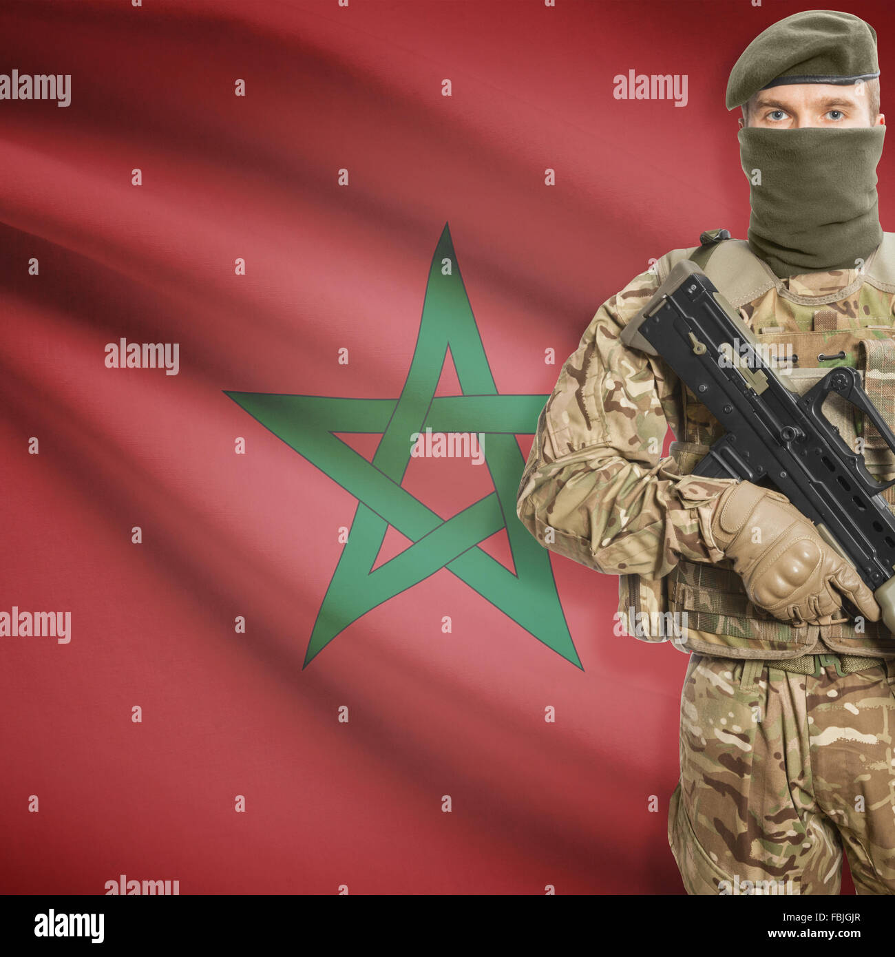 Soldier with machine gun and national flag on background series ...