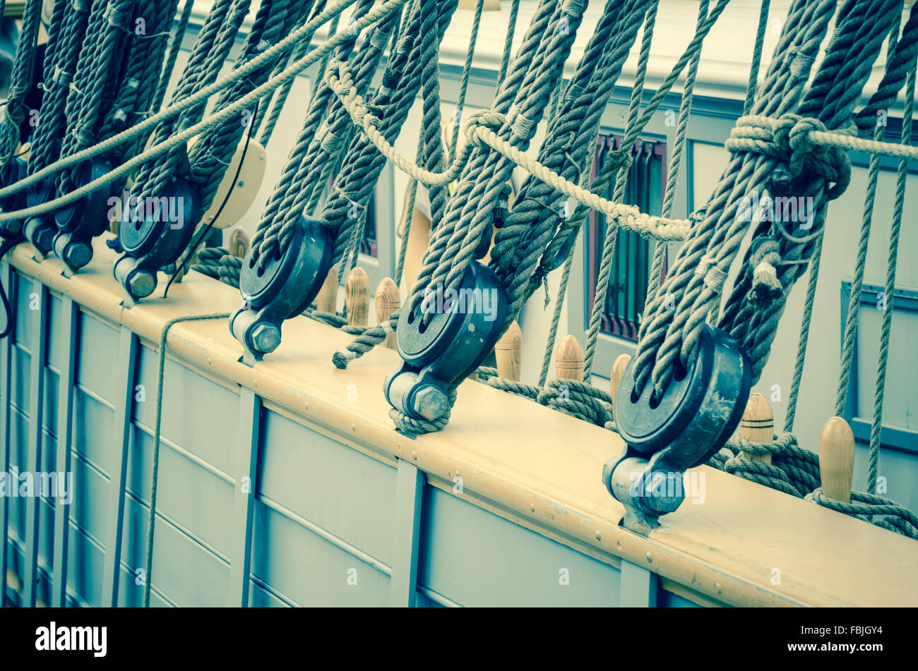 Blocks and rigging of an old sailboat, close-up, toning Stock Photo - Alamy