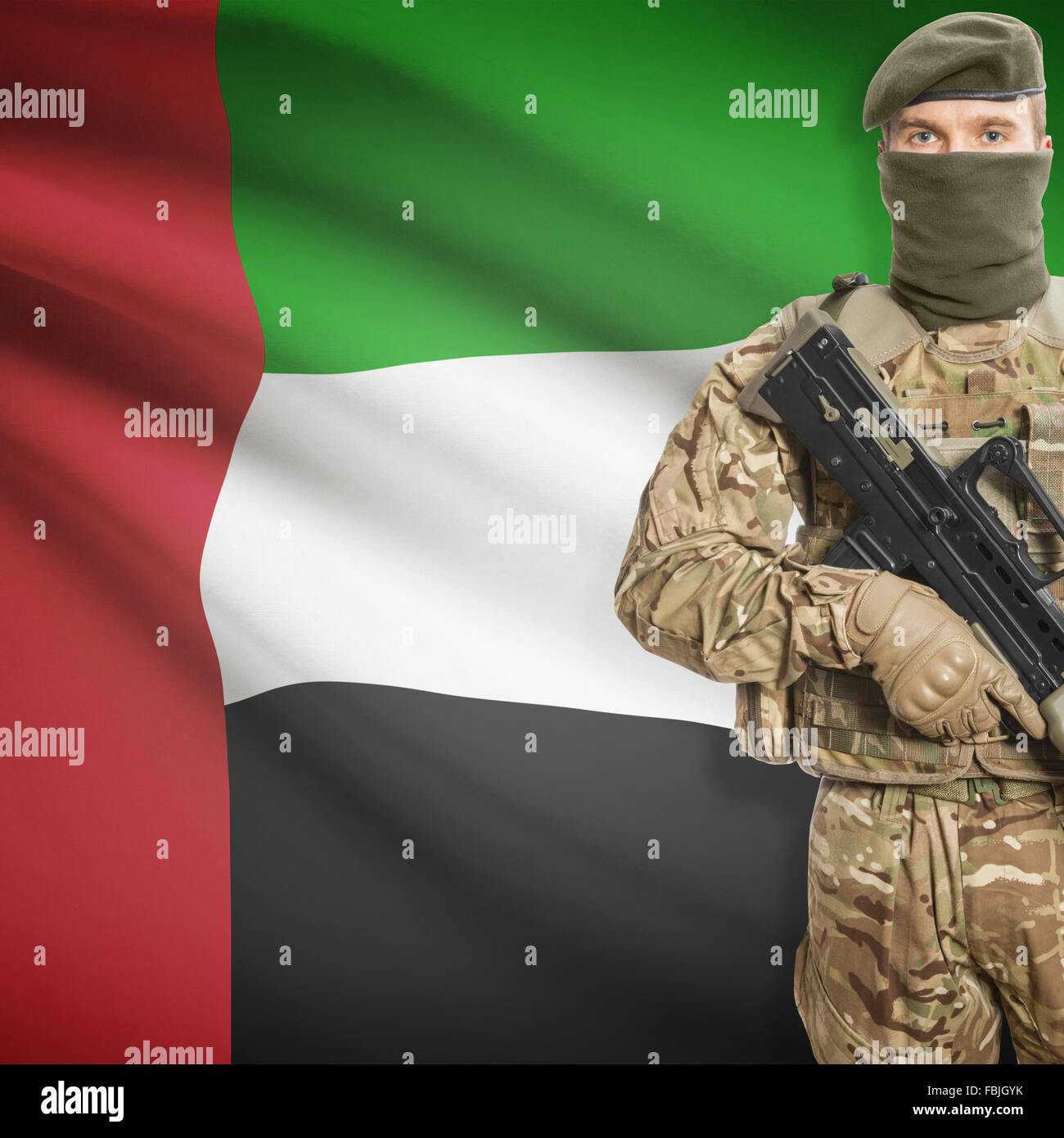 Soldier with machine gun and national flag on background series ...
