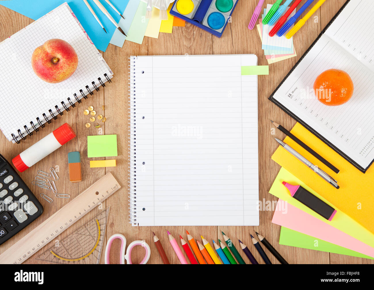 on a desk with pens and accessories to draw a copybook Stock Photo - Alamy