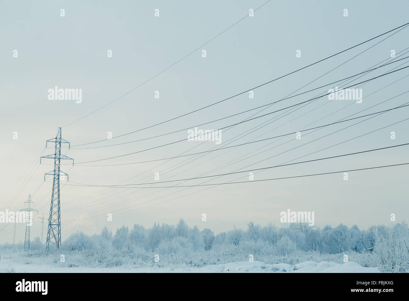 Winter landscape with power line Stock Photo - Alamy