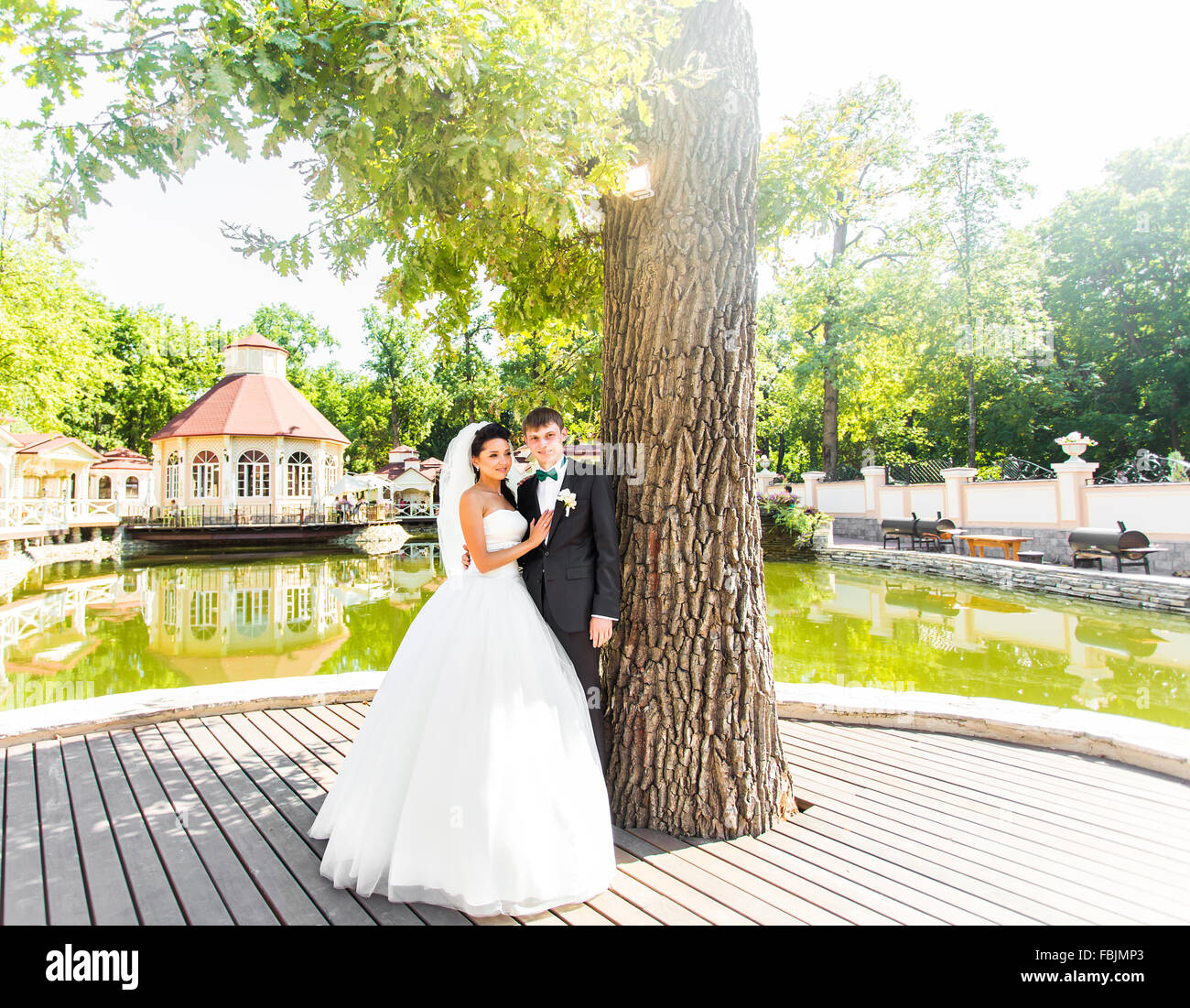 Bride and groom having a romantic moment on their wedding day Stock ...