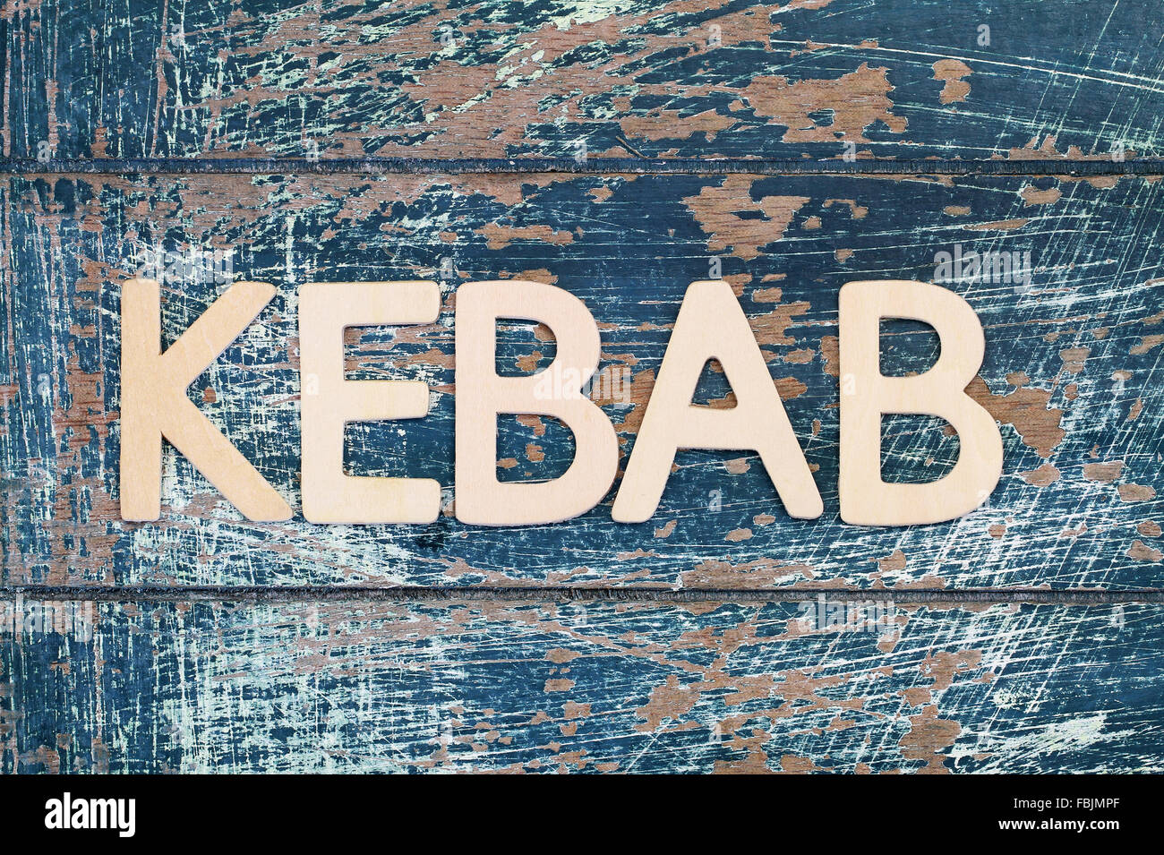 Word kebab written with wooden letters on rustic surface Stock Photo ...