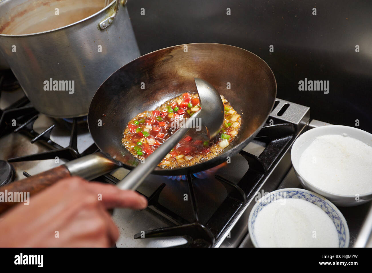 Thai food cooking in a wok Stock Photo - Alamy