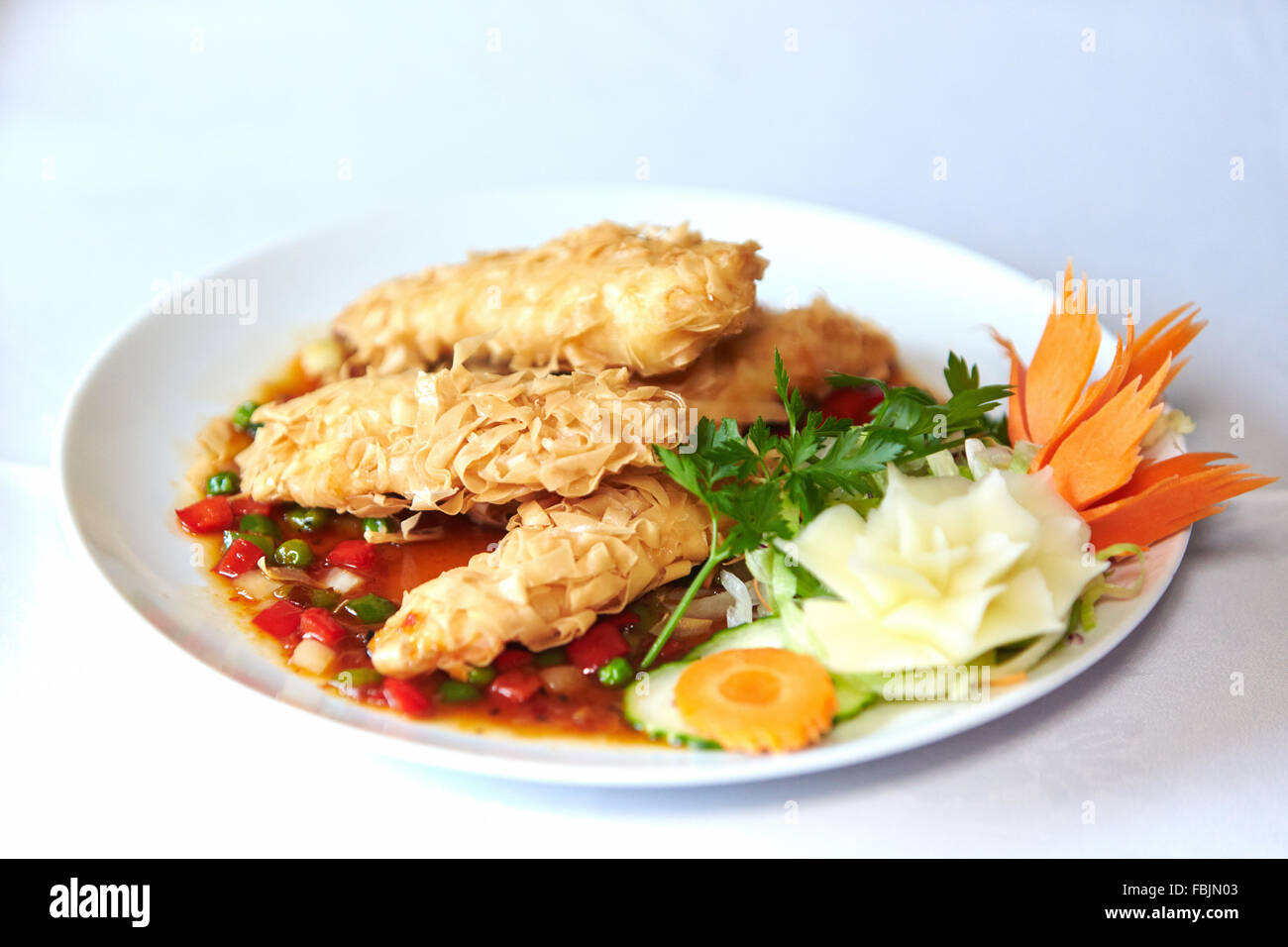 Fried pastry fish with sweet chilli sauce from the Thai menu at the ...