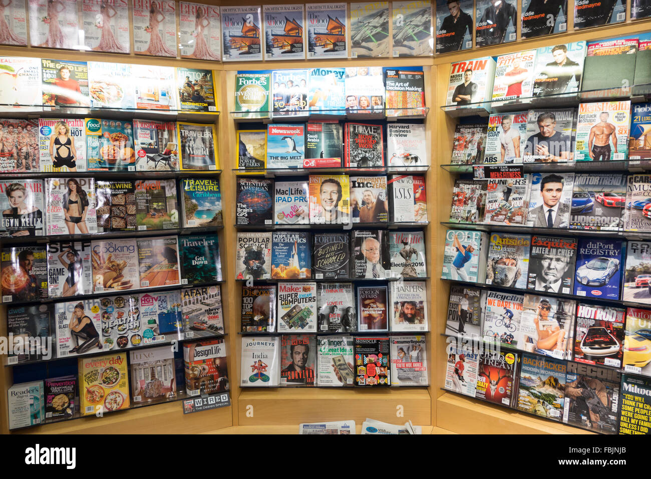 magazine shelf display Stock Photo - Alamy