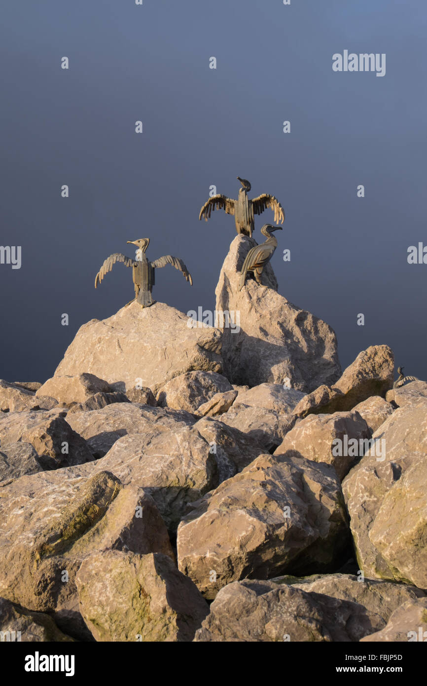 Stone bird statues at the stone jetty. Morecambe Bay Lancashire England ...