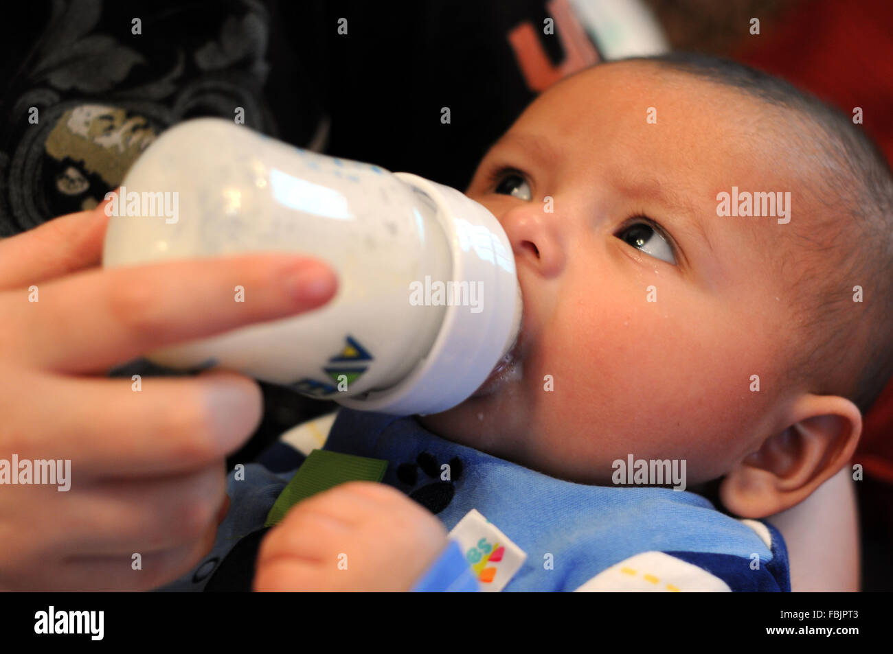 A baby feeding Stock Photo - Alamy