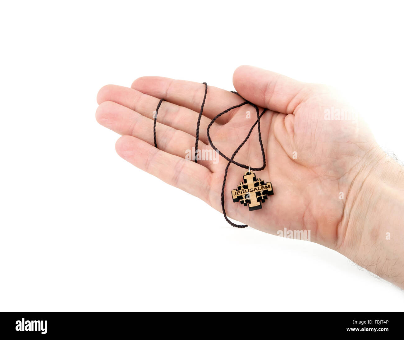 Cross in hand Cut Out Stock Images & Pictures - Alamy