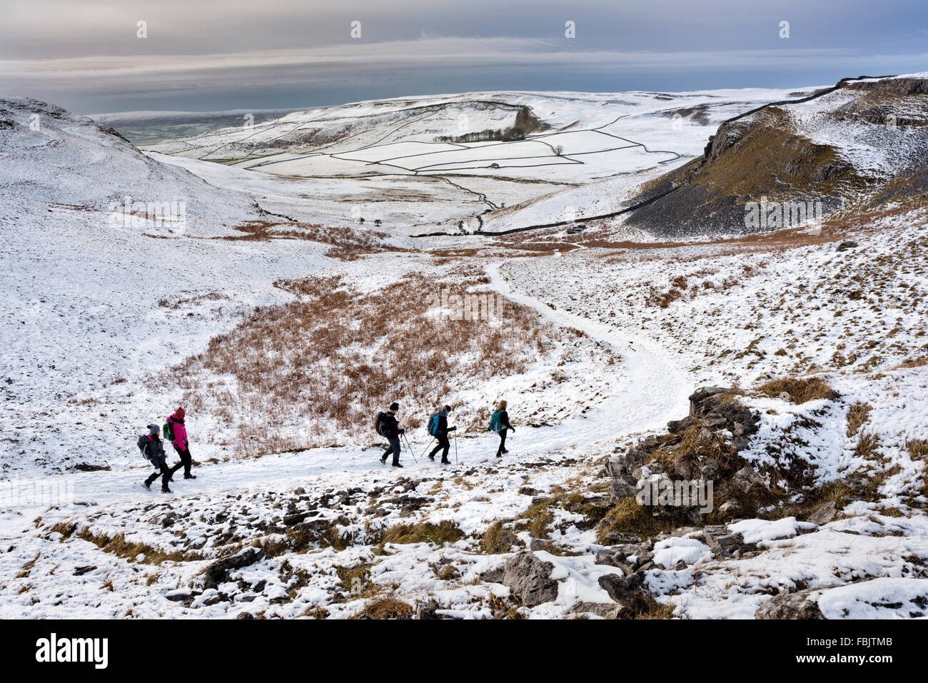Walkers in a snowy Crummackdale, between Horton-in-Ribbledale and ...